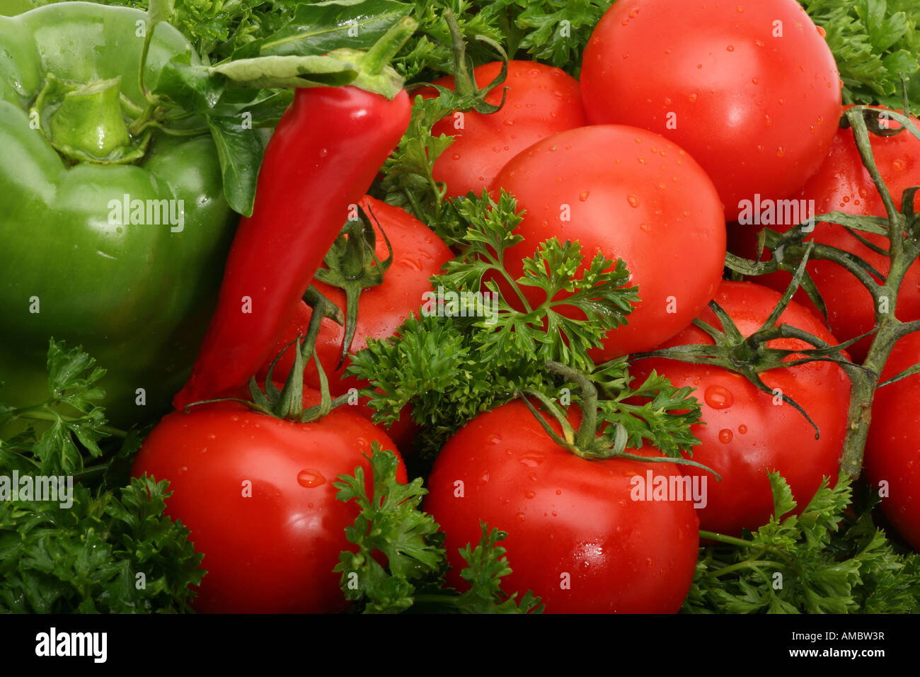 Fresh cherry tomatoes in a basket selling vegetables at American farmers market from above ...