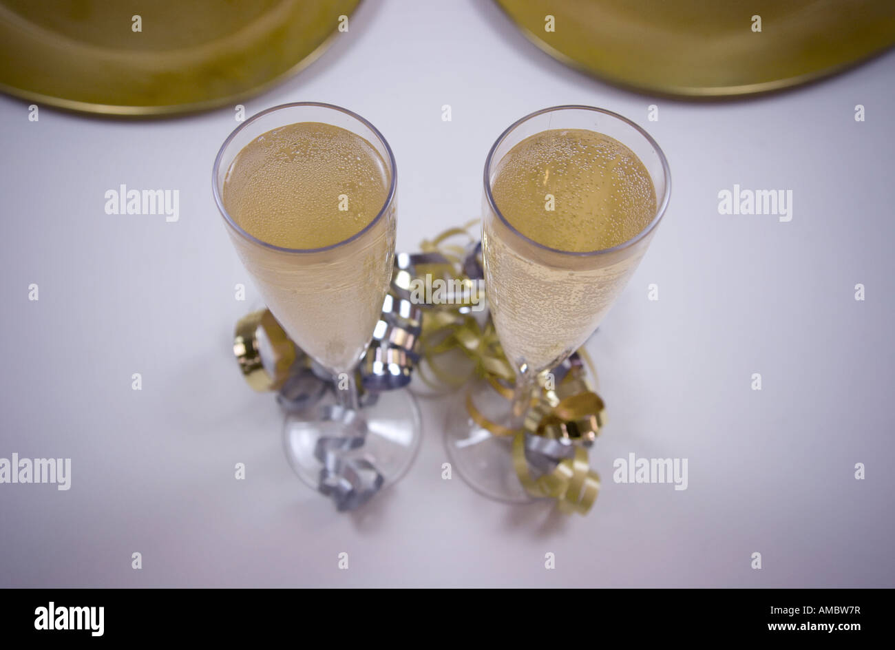 Champagne flutes on a fancy dinner table Stock Photo - Alamy