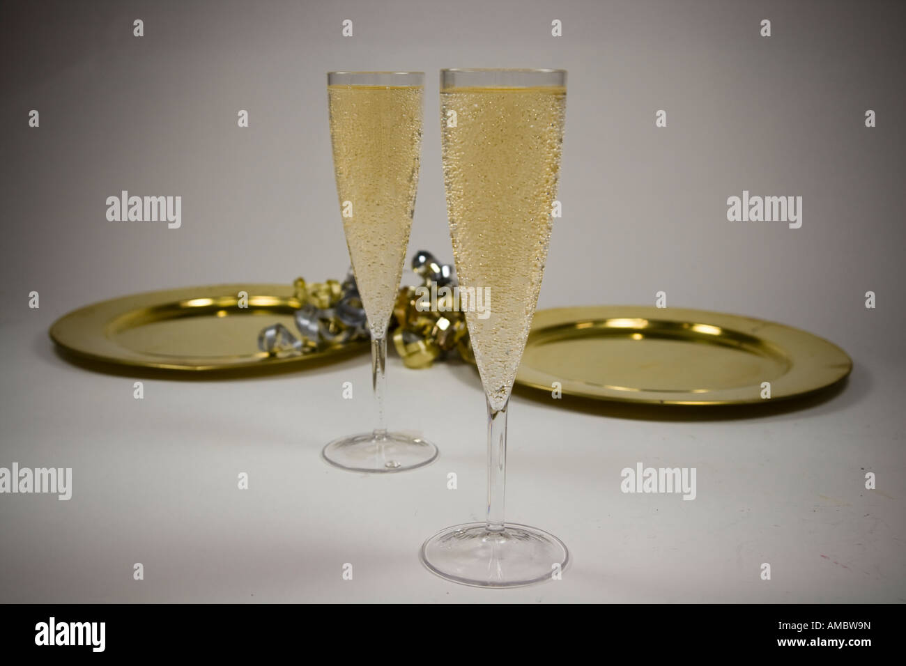 Champagne flutes on a fancy dinner table Stock Photo - Alamy