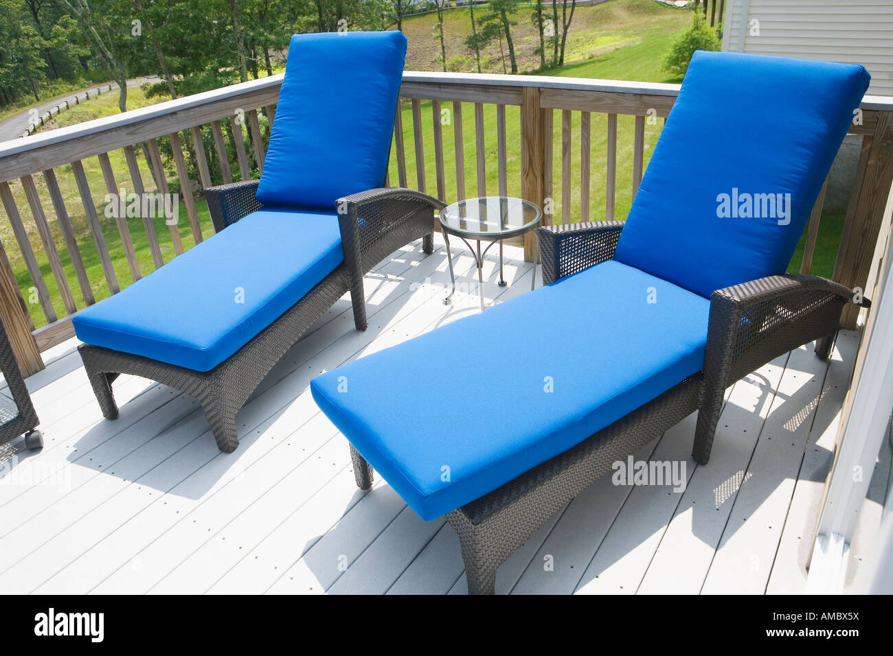 High angle view of lounge chairs on a deck Stock Photo - Alamy