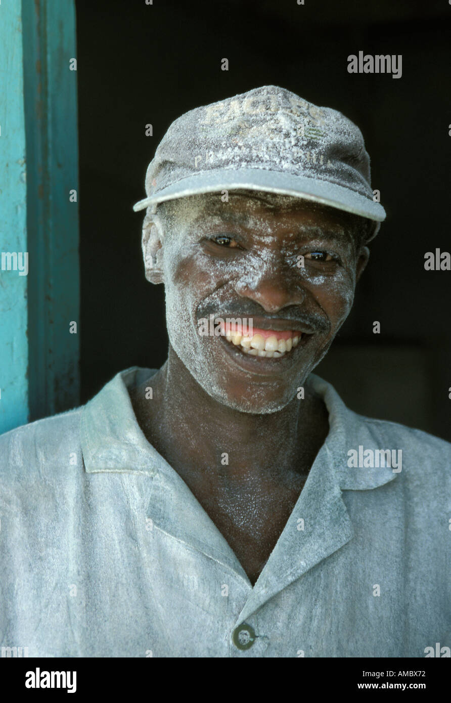 Portrait of a worker working in a flour factory Stock Photo - Alamy