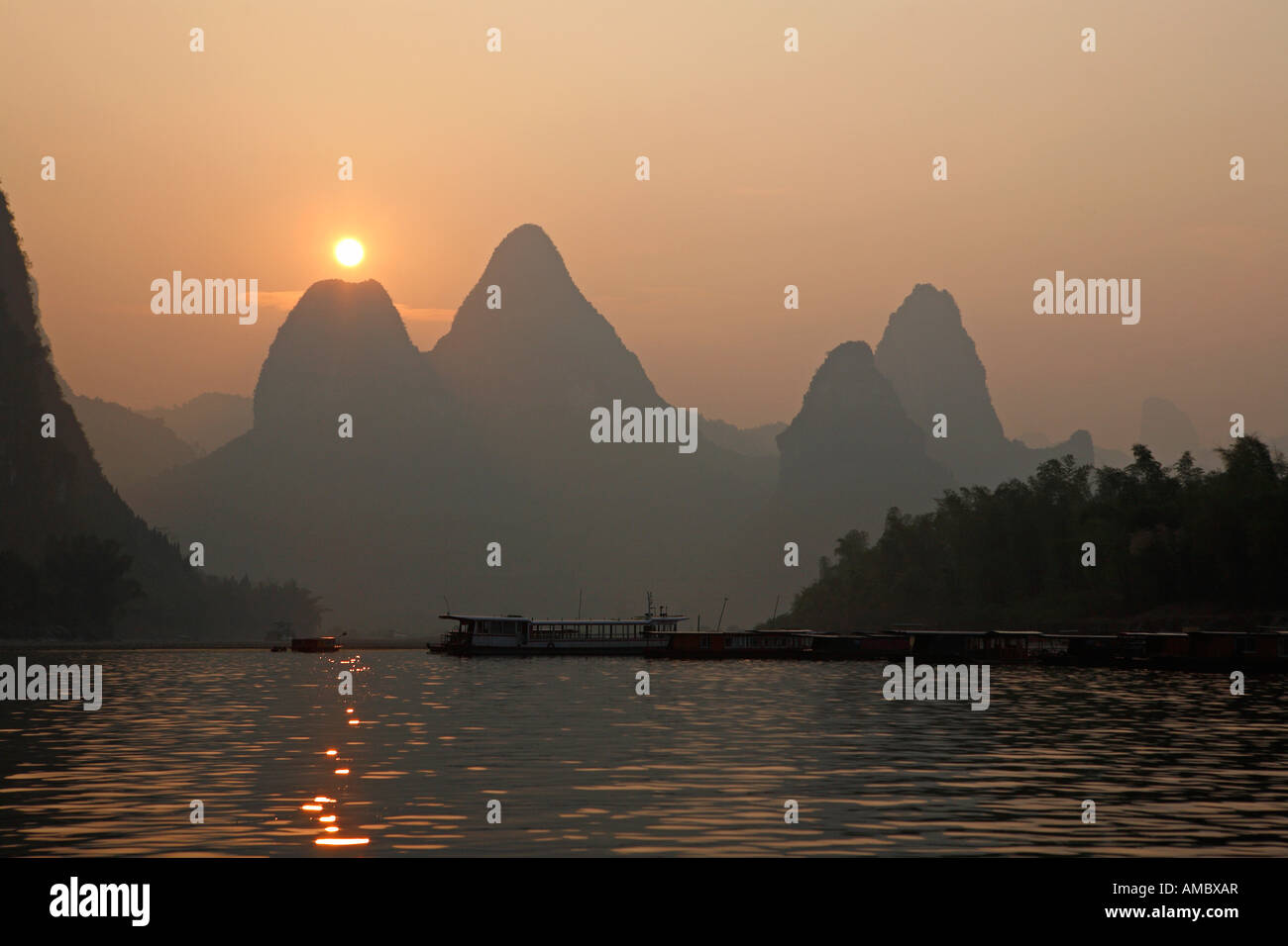 Sunset on Li River near Yangshuo, China Stock Photo - Alamy