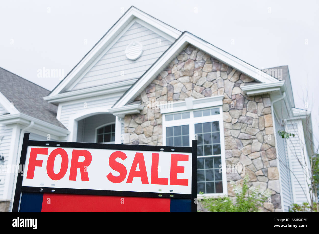 For Sale signboard in front of a house Stock Photo - Alamy
