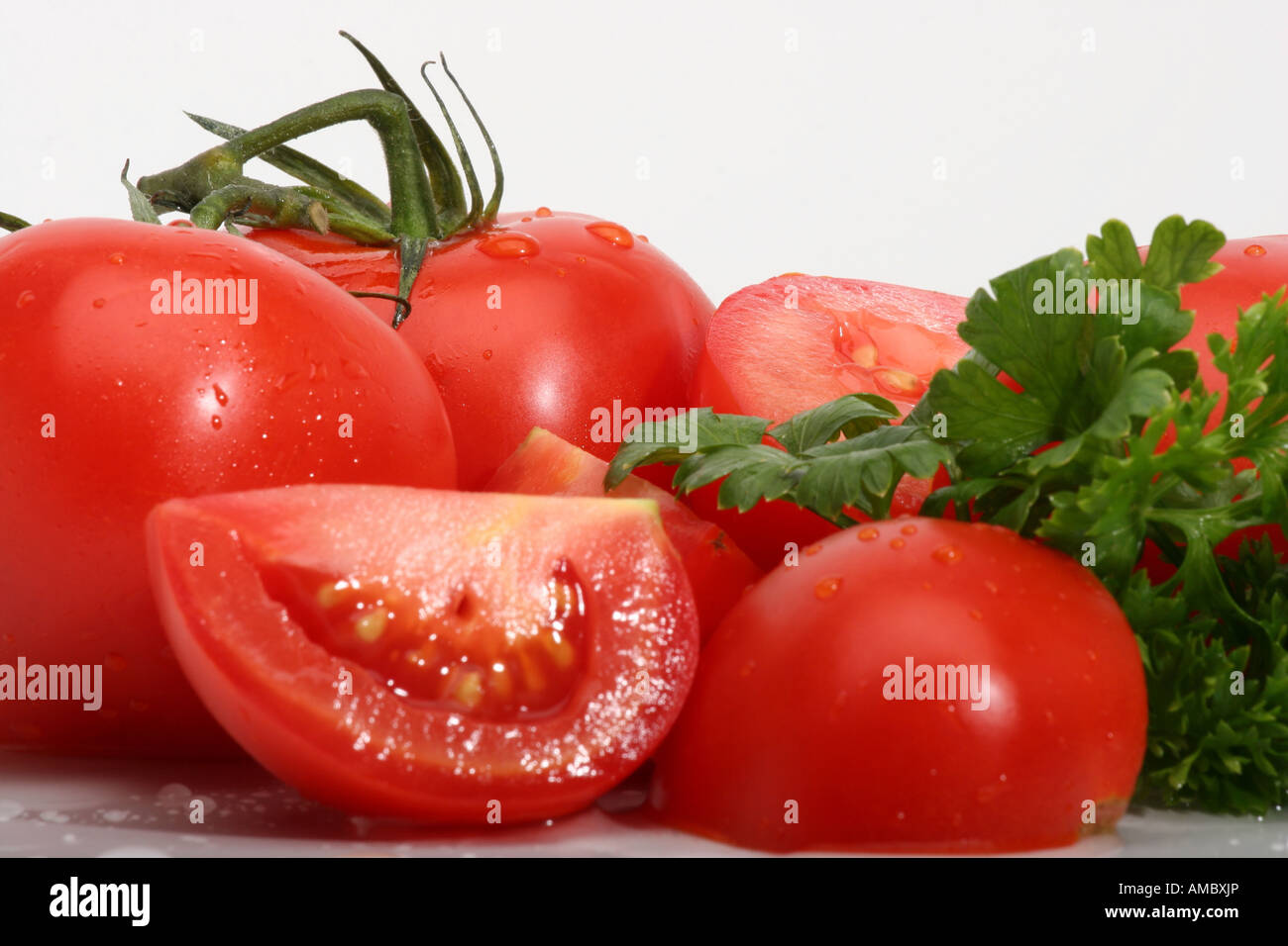 Fresh cherry tomatoes in a basket selling vegetables at American farmers market from above ...