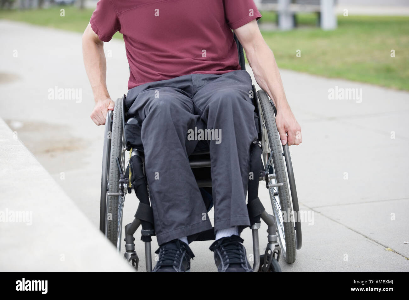 Handicapped man on a wheel chair Stock Photo - Alamy