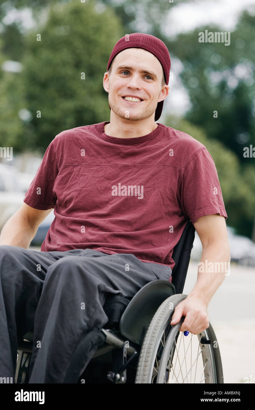 Handicapped man on a wheel chair Stock Photo - Alamy
