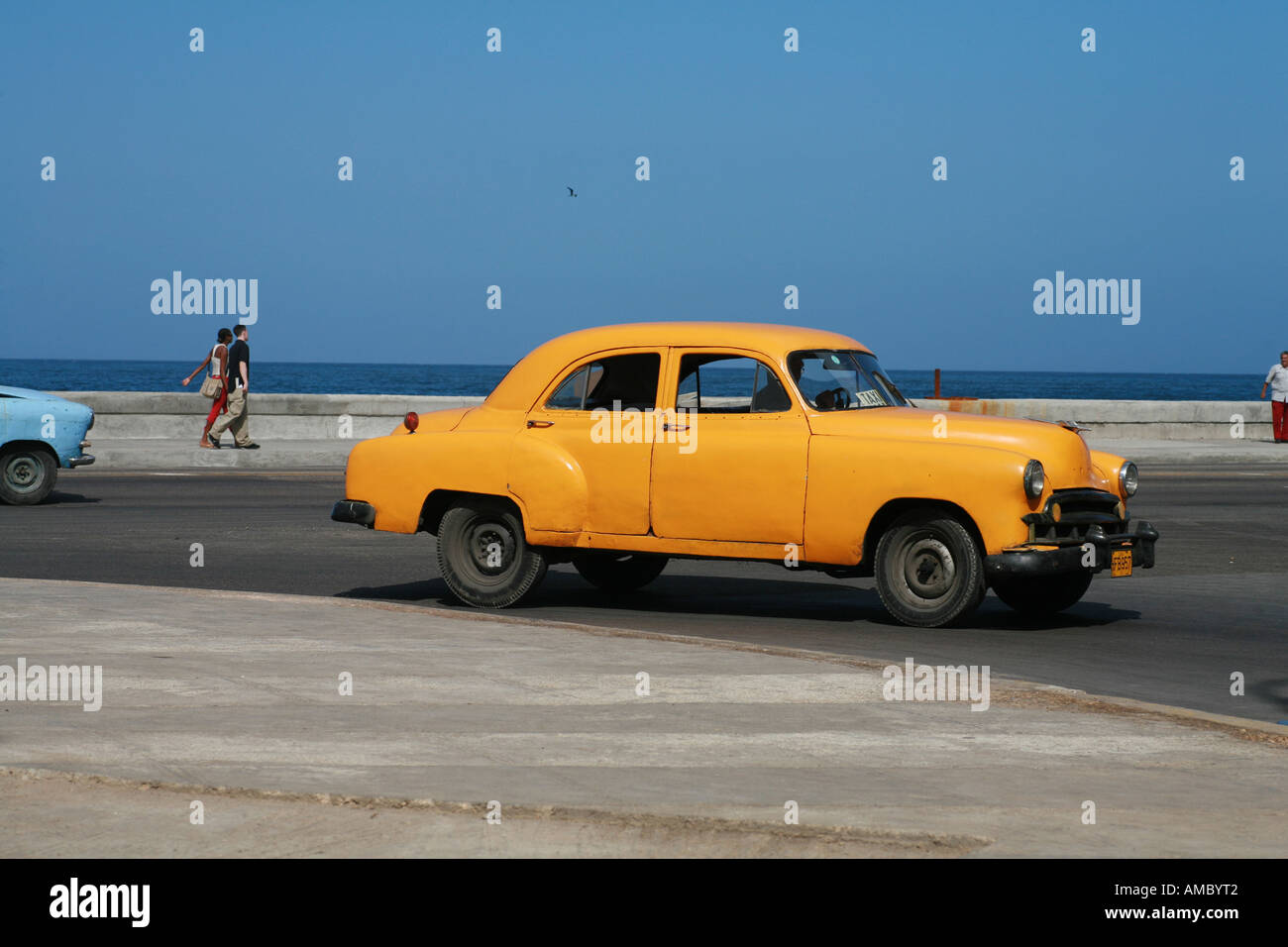 Cuba Havana traffic at the malecón road close to the bay estrecho de la ...