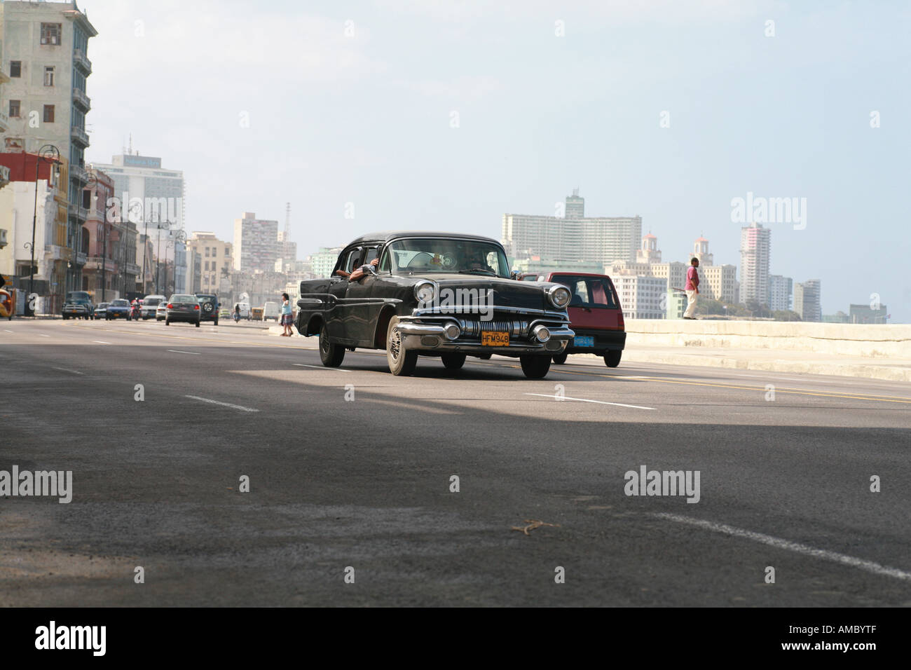 Cuba Havana traffic at the malecón road close to the bay estrecho de la ...
