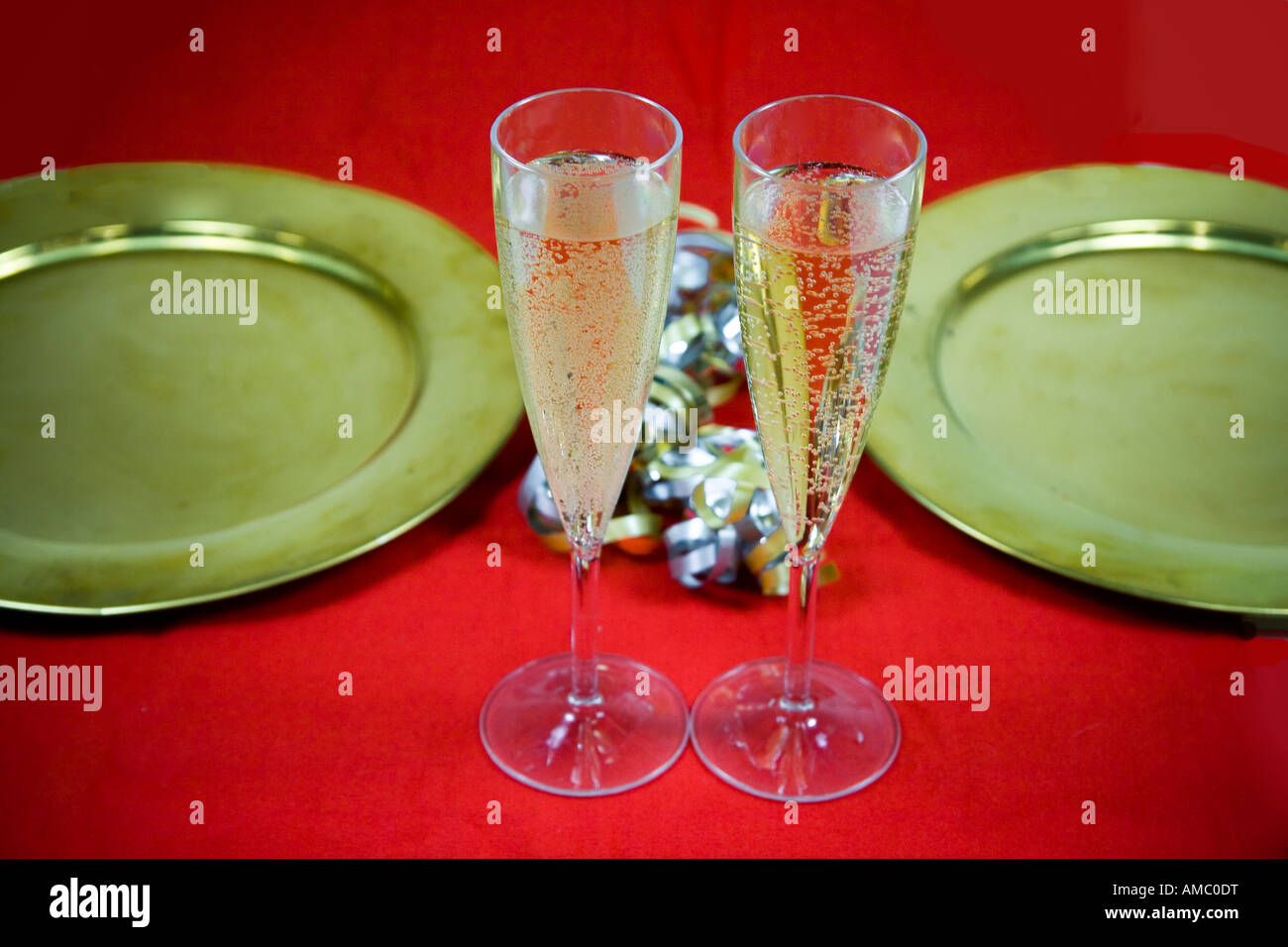 Champagne flutes on a fancy dinner table Stock Photo - Alamy
