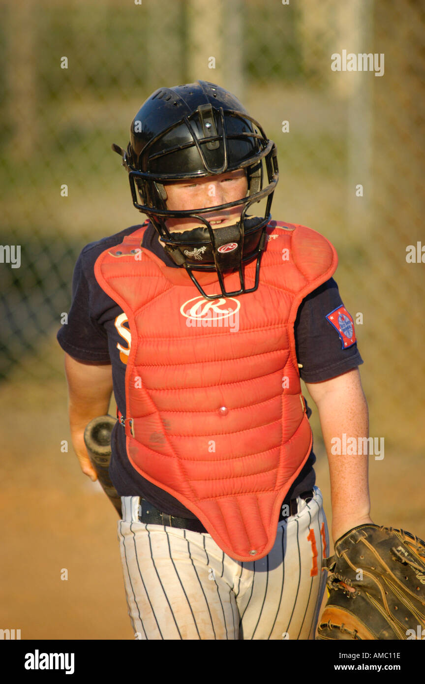 Youth Baseball Catcher with full protective gear at practice with his ...