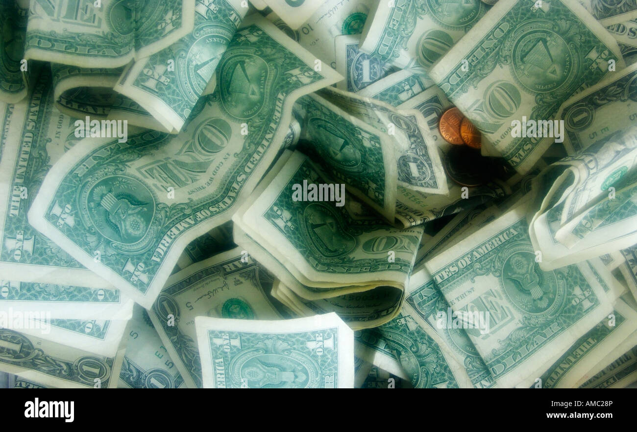 Pile us currency notes coins hi-res stock photography and images - Alamy