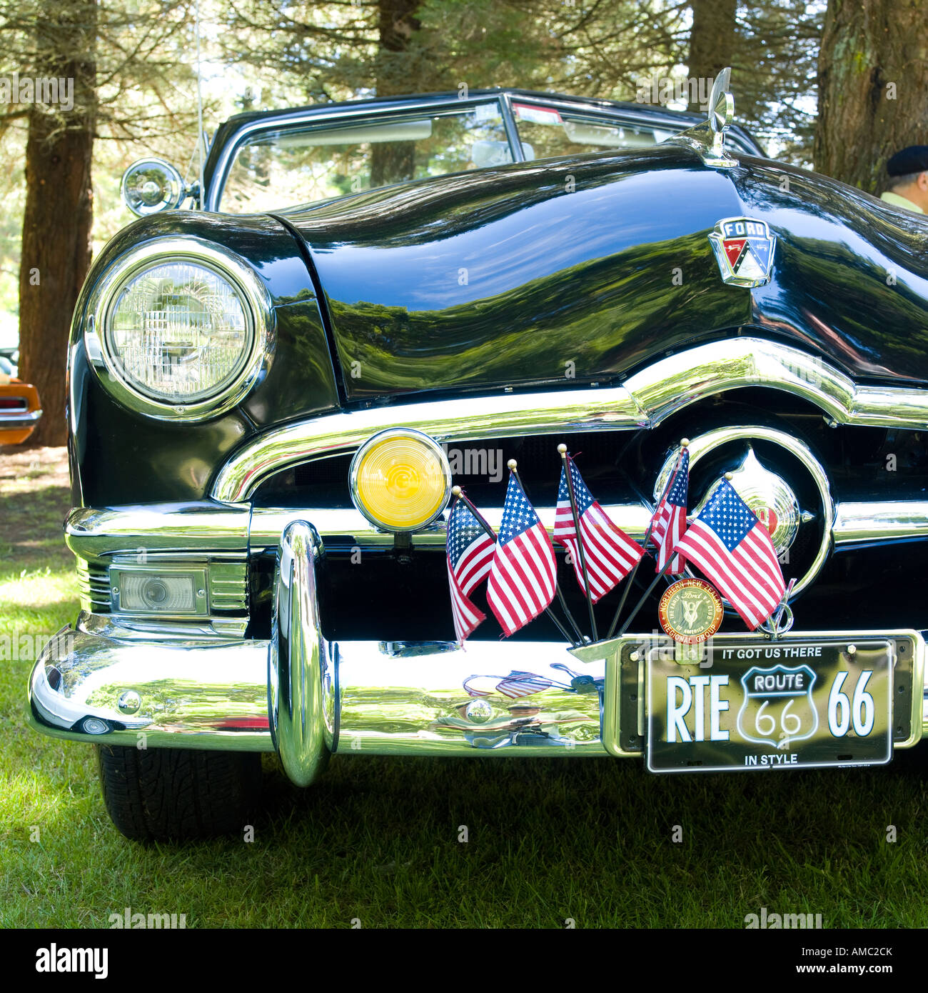 American flag on car with route 66 number plate Stock Photo - Alamy