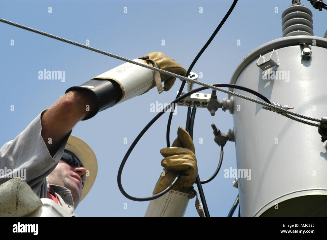 Electric Company Linemen Working on real Power Transmission Lines in ...