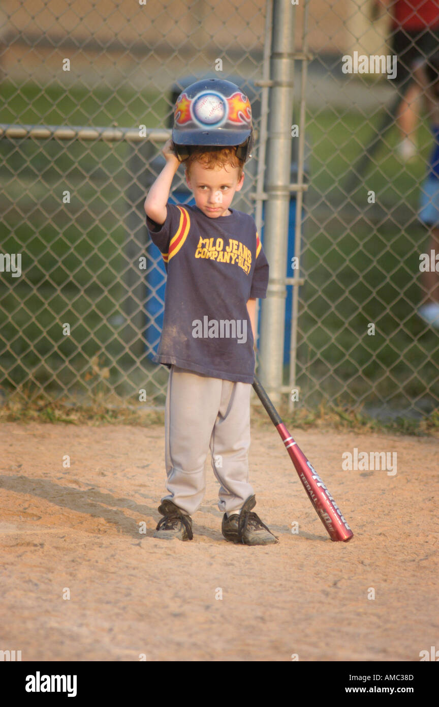 Young Caucasian 5 year old Boy learning to hit a pitched baseball at ...