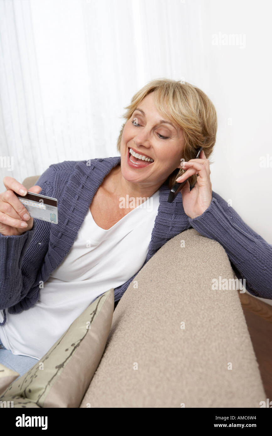 Senior woman hold credit card hi-res stock photography and images - Alamy