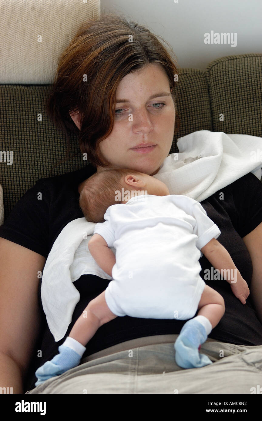 New born baby boy 1 one months in its mothers arms Stock Photo - Alamy