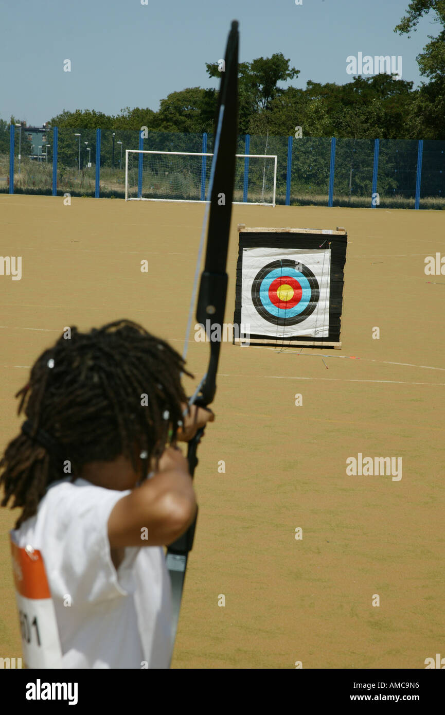 boy doing archery Stock Photo - Alamy