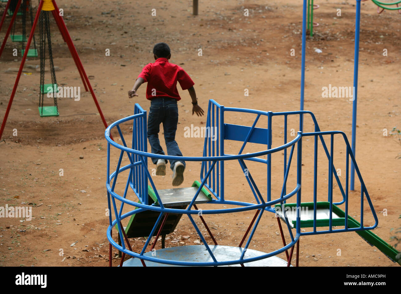 With a sense of risk taking and adventure a young boy jumps from a ...