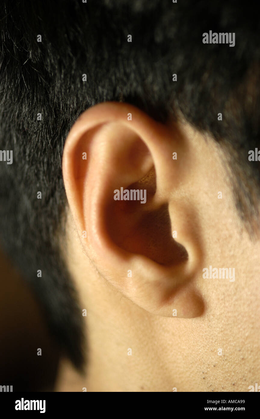 Ear detail listening listen problem hear Stock Photo - Alamy