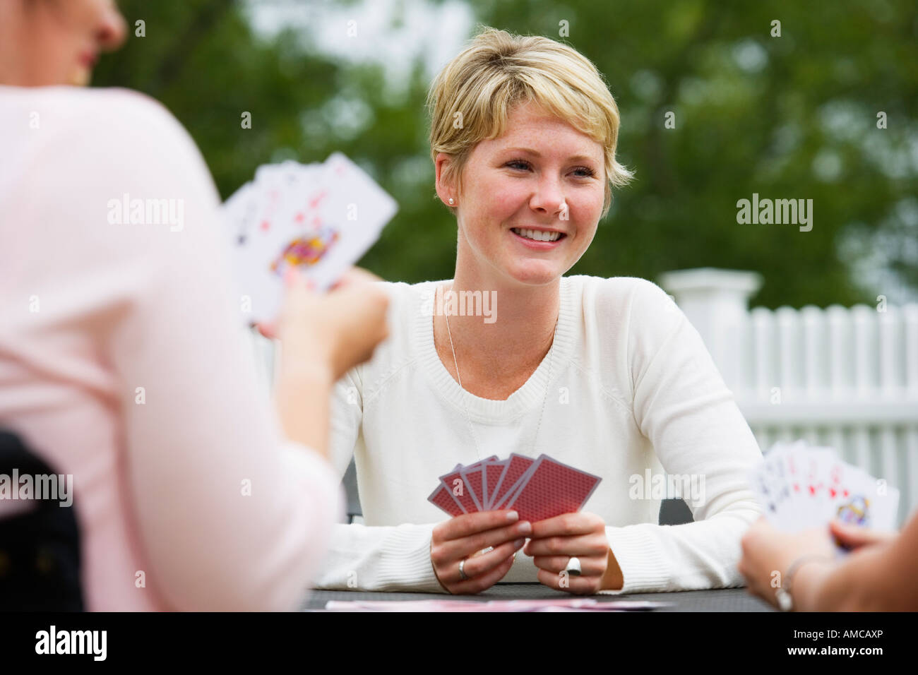 Playing with the jewelry of a woman hi-res stock photography and images ...