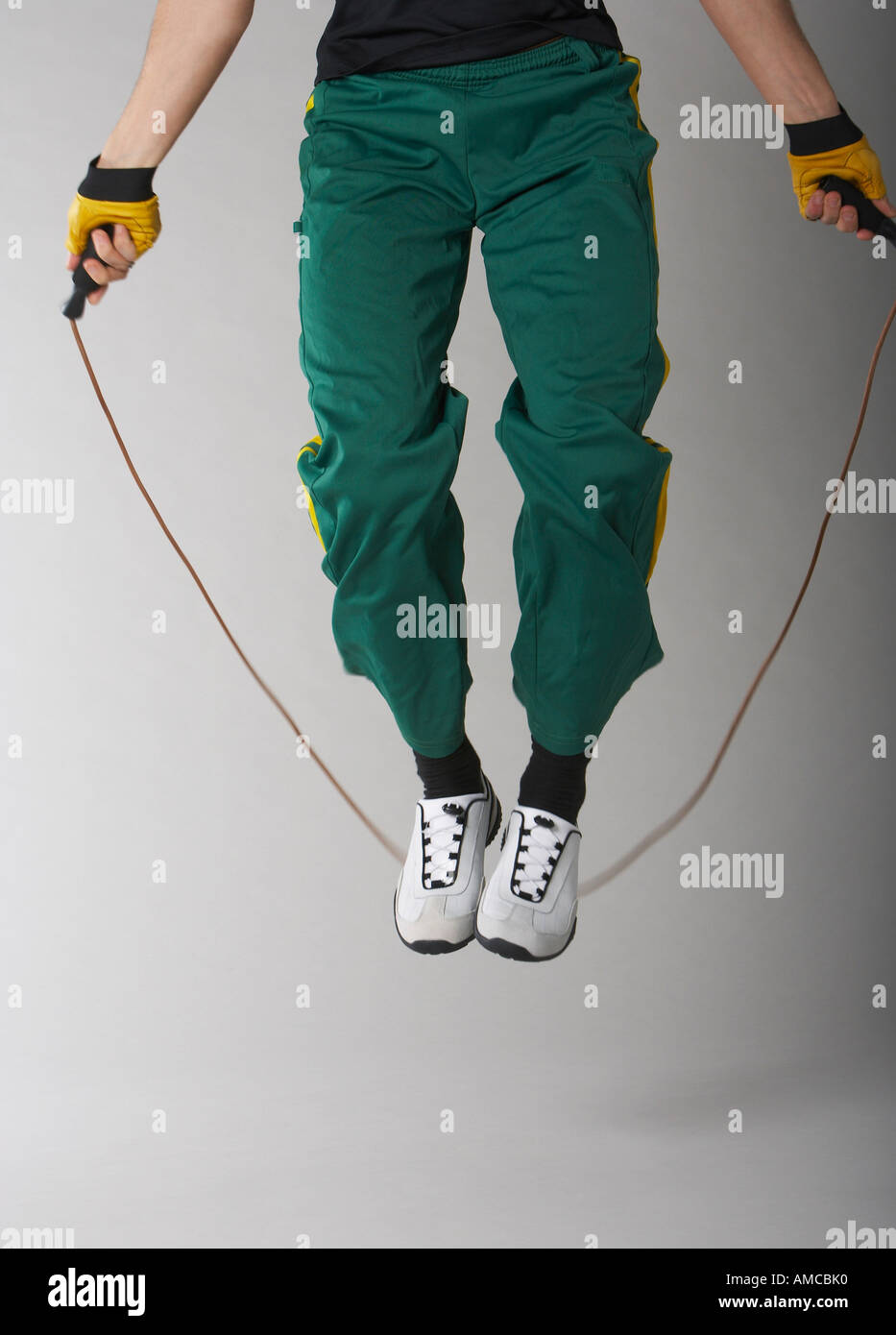 Legs man jumping rope in hi-res stock photography and images - Alamy