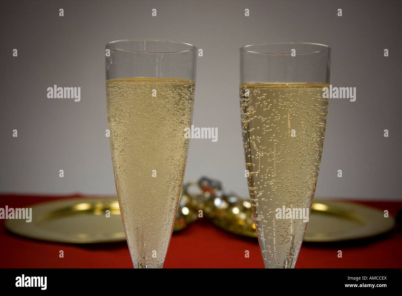 Champagne flutes on a fancy dinner table Stock Photo - Alamy