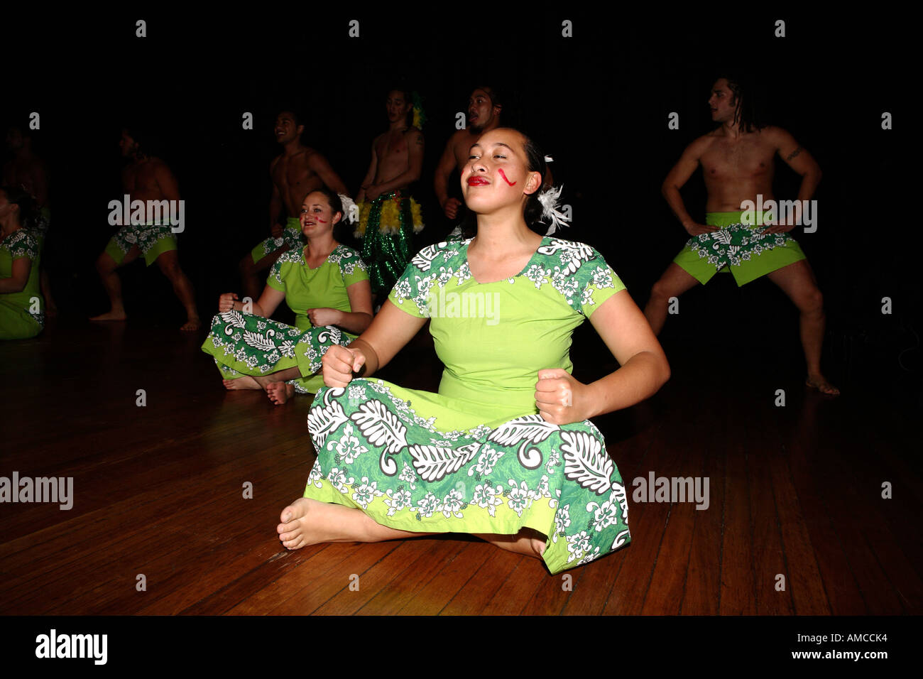 Maori touring group of dancers and singers performing traditional ...