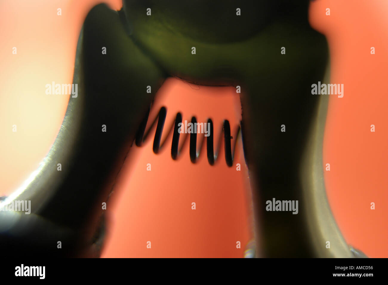 A close-up of pilers on a red background Stock Photo - Alamy