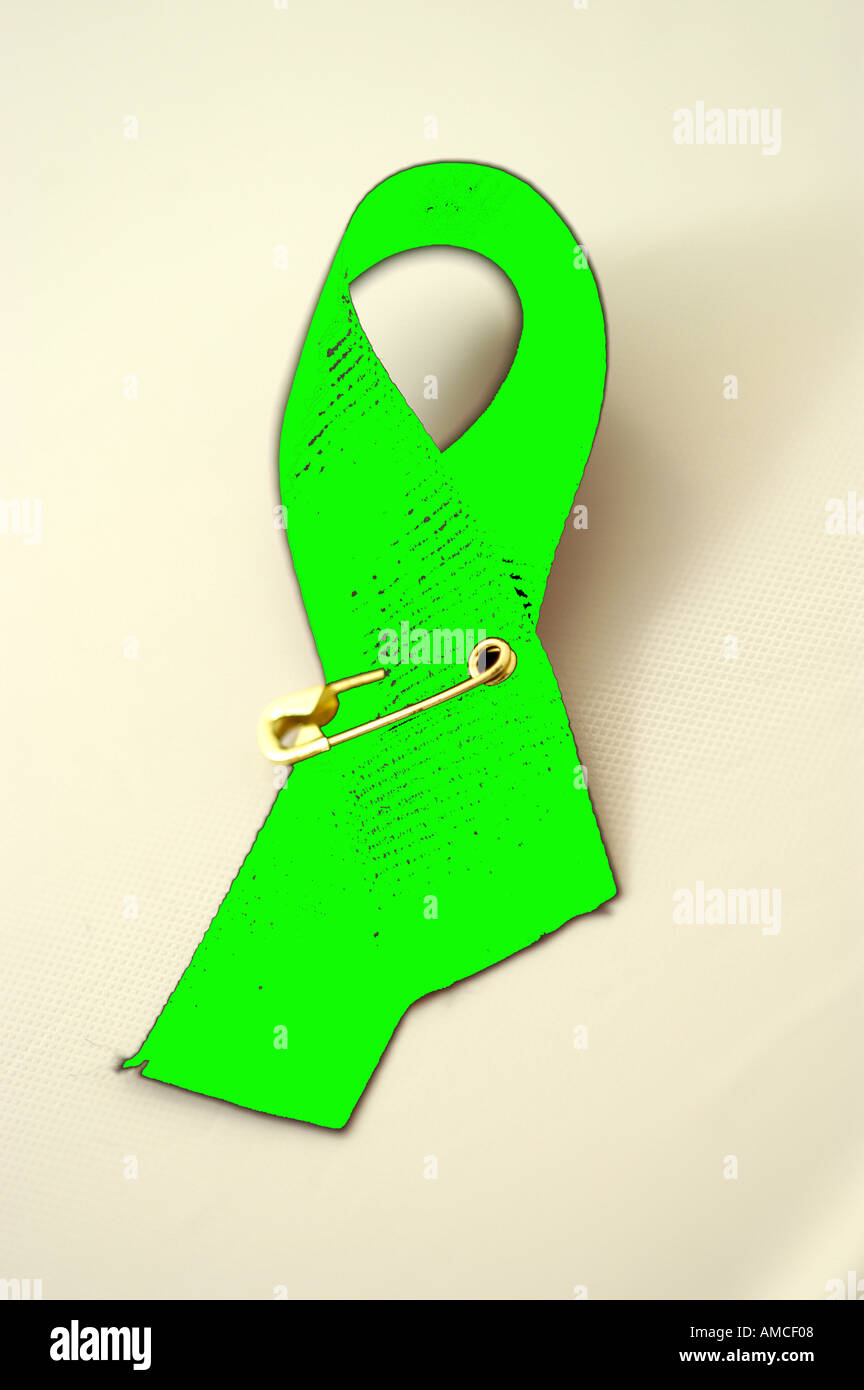 ribbon neon safety gold pin symbol green vertical Stock Photo - Alamy