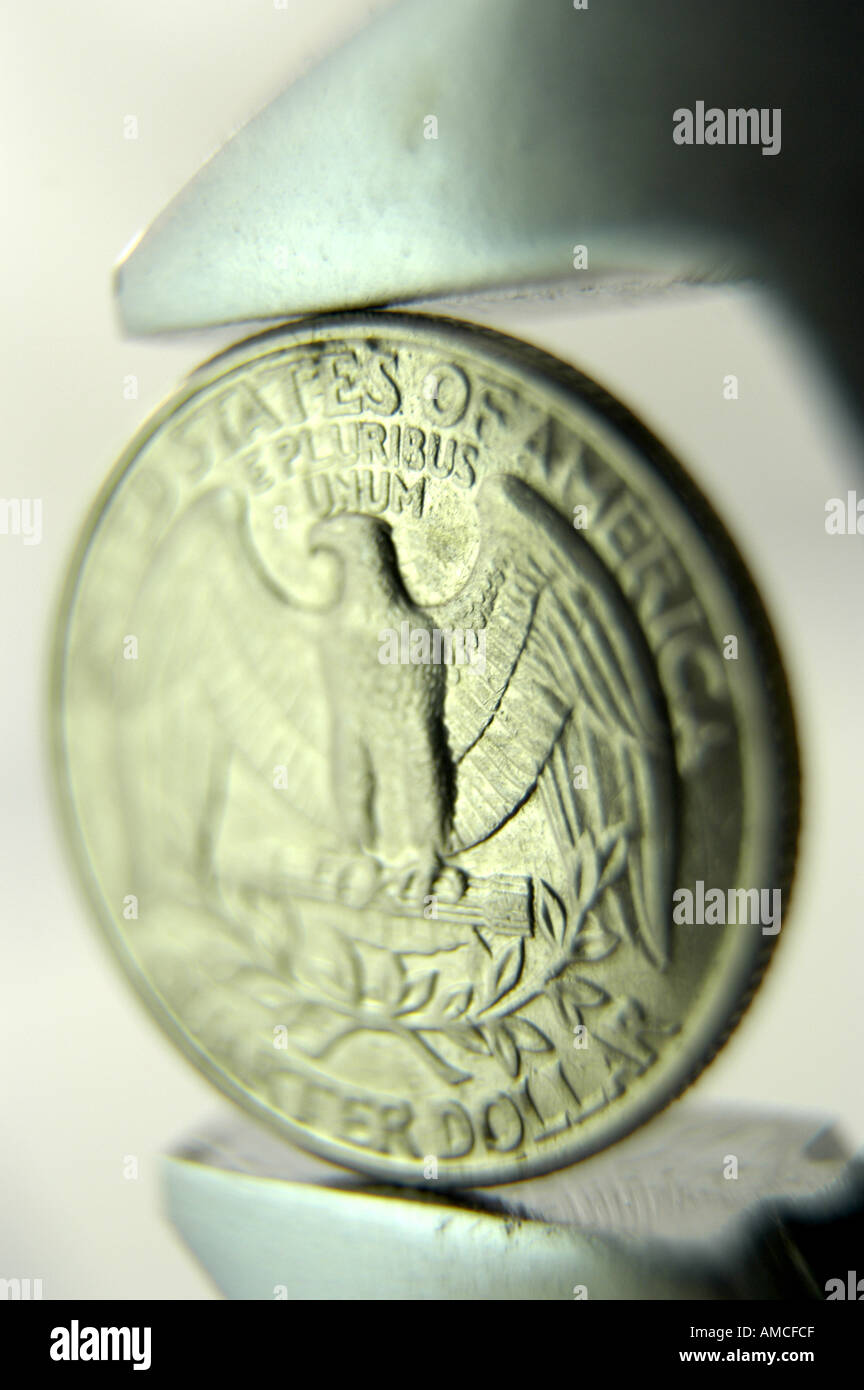 U S quarter dollar coin in measuring tool vertical Stock Photo - Alamy