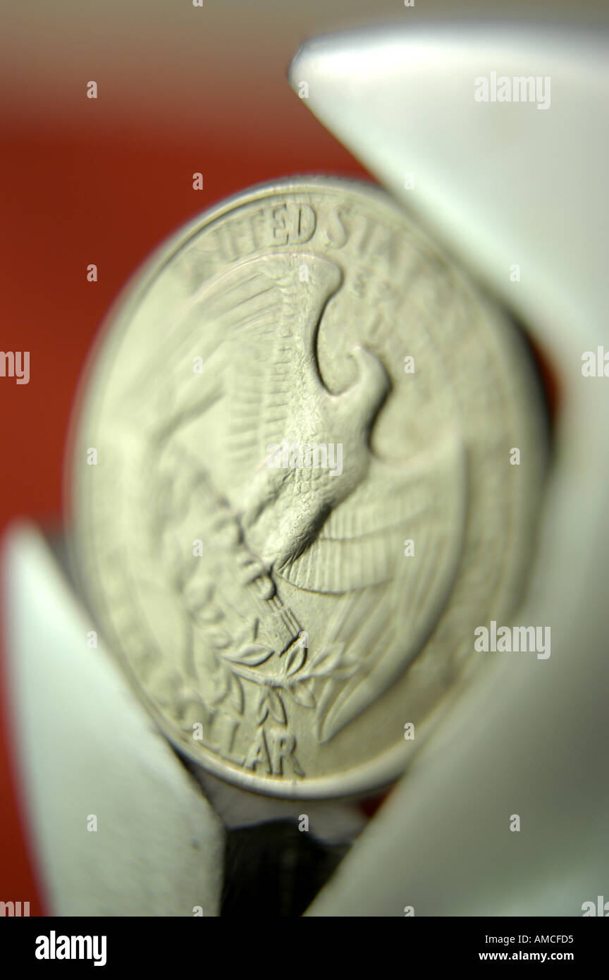 U S quarter dollar coin in measuring tool vertical Stock Photo - Alamy