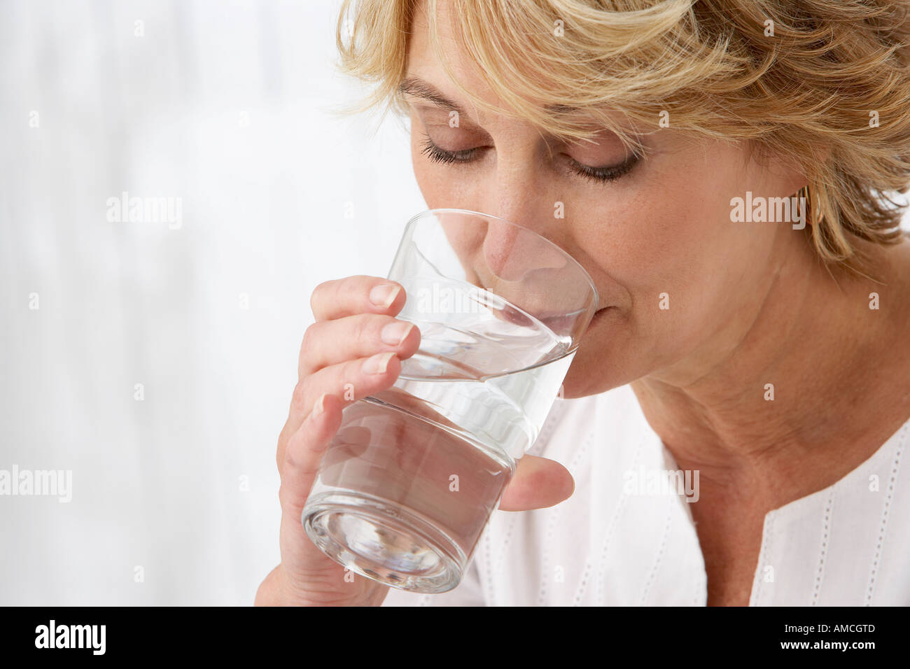 Woman Drinking Water Stock Photo - Alamy