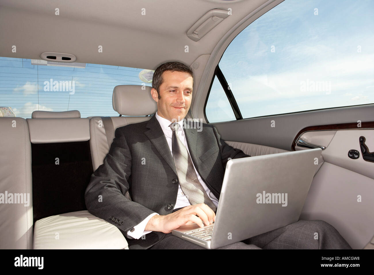 Businessman sitting on top world hi-res stock photography and images ...