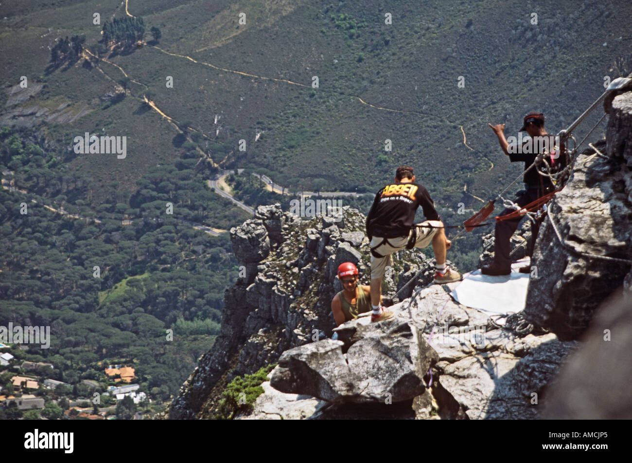 CAPE TOWN SOUTH AFRICA October Man abseiling from the top of Table ...