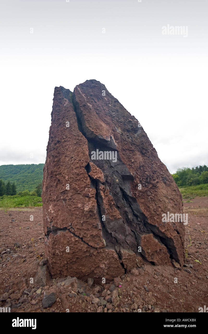 A huge spindle-shaped volcanic bomb (Puy-de-Dôme - France). Bombe ...