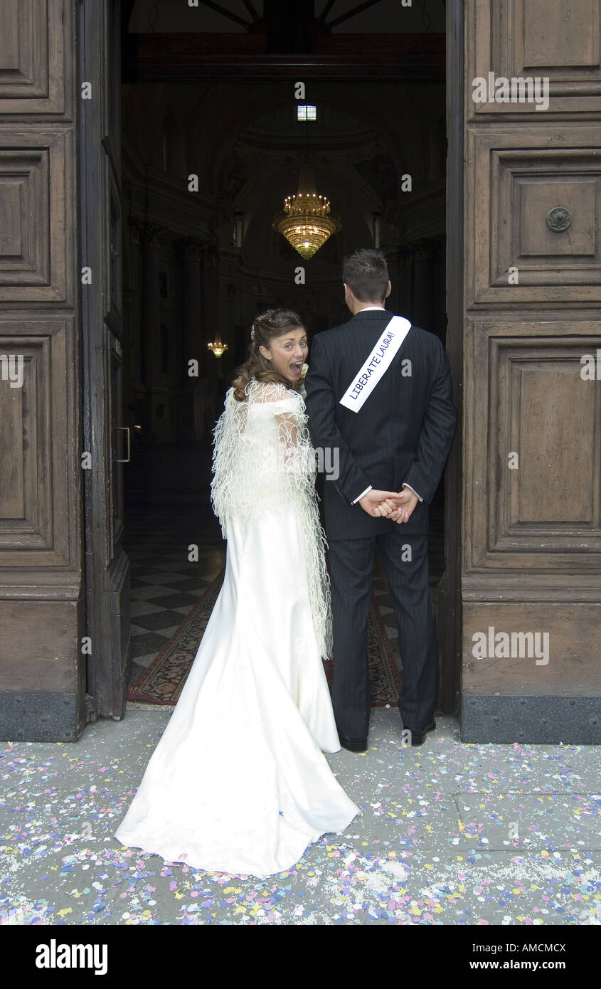 Two spouses out of the church joke Stock Photo - Alamy