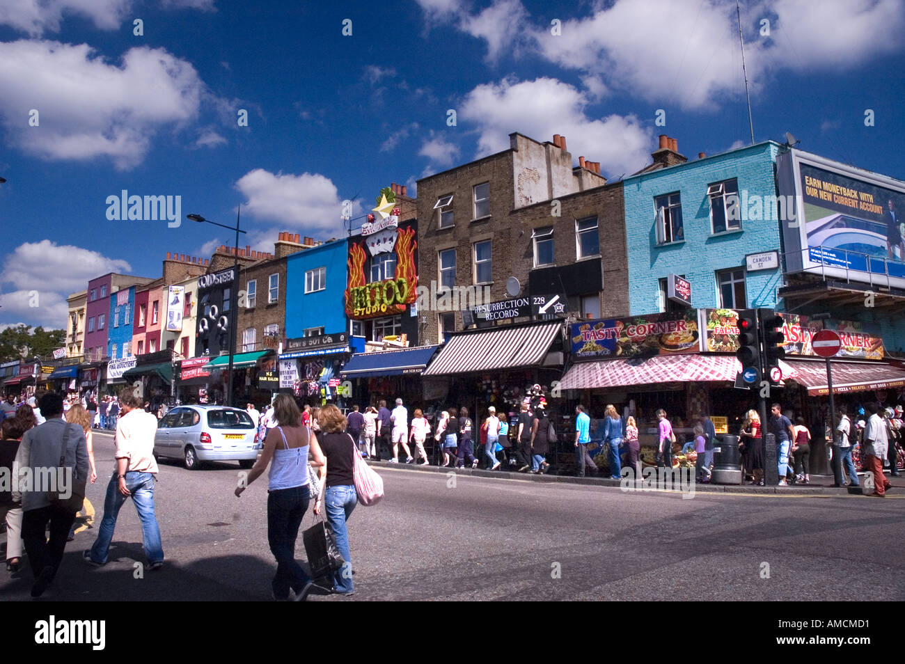Tourists on a street, Camden High Street, Camden Town, London, England ...