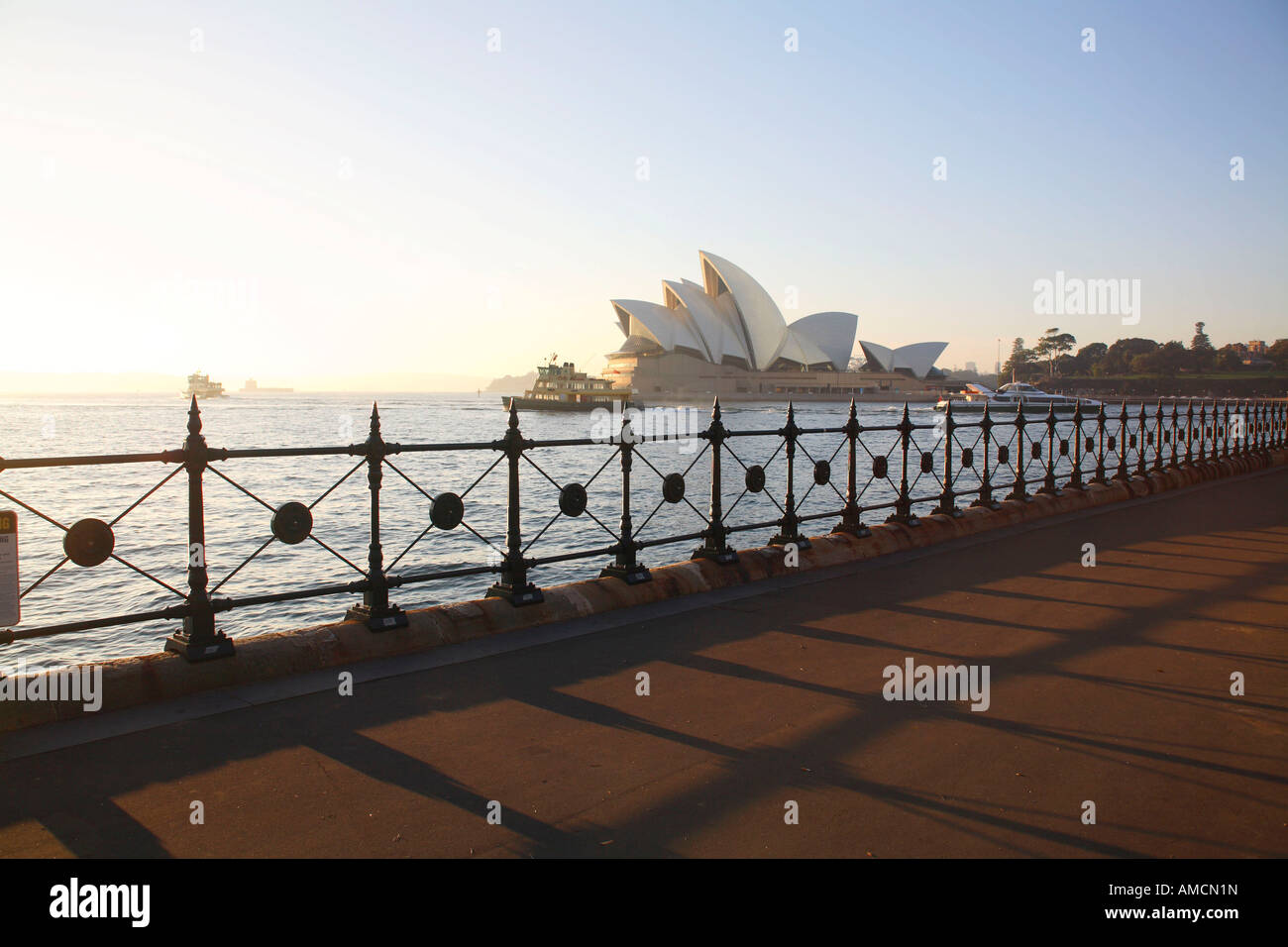 Sydney Harbour Ferry passing the Sydney Opera House on Bennelong Point ...