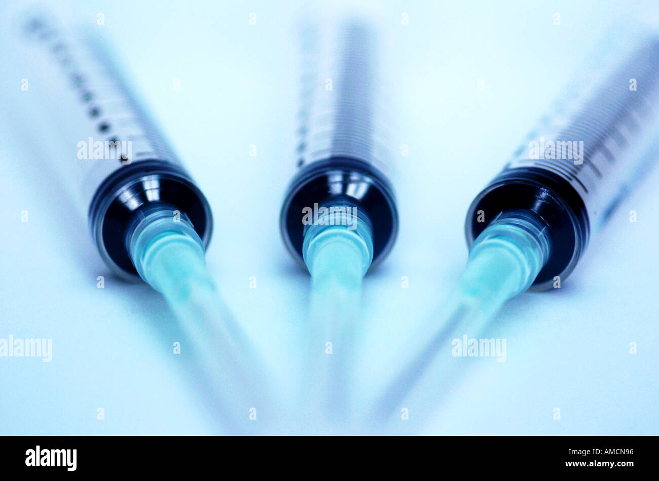 Syringes with needles Stock Photo - Alamy