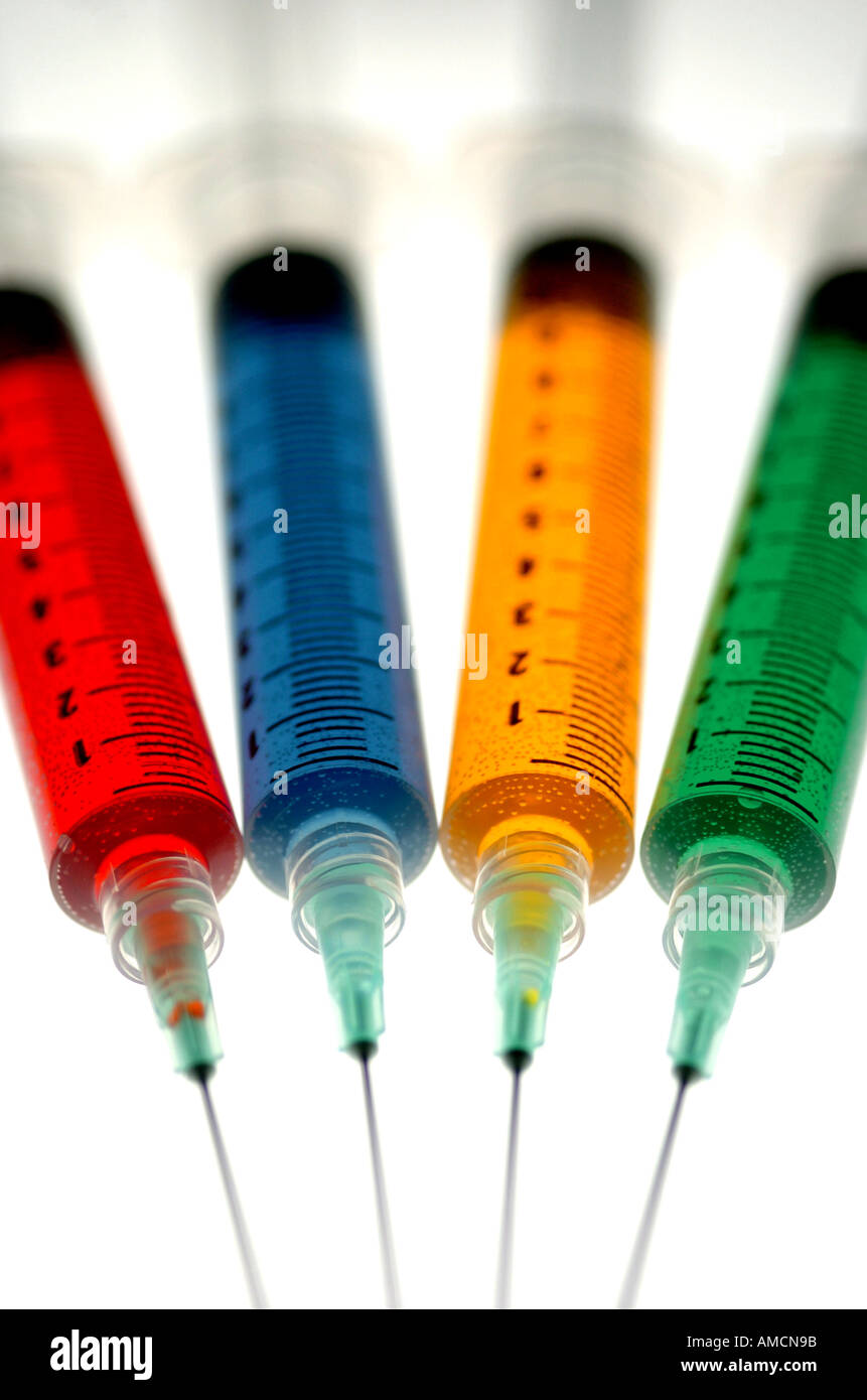 Coloured syringes hi-res stock photography and images - Alamy