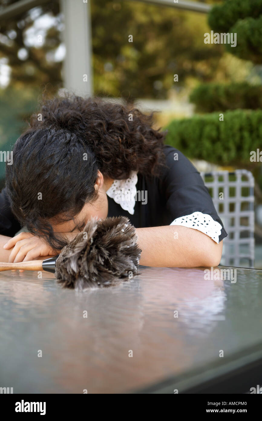 Woman slumped on table hi-res stock photography and images - Alamy
