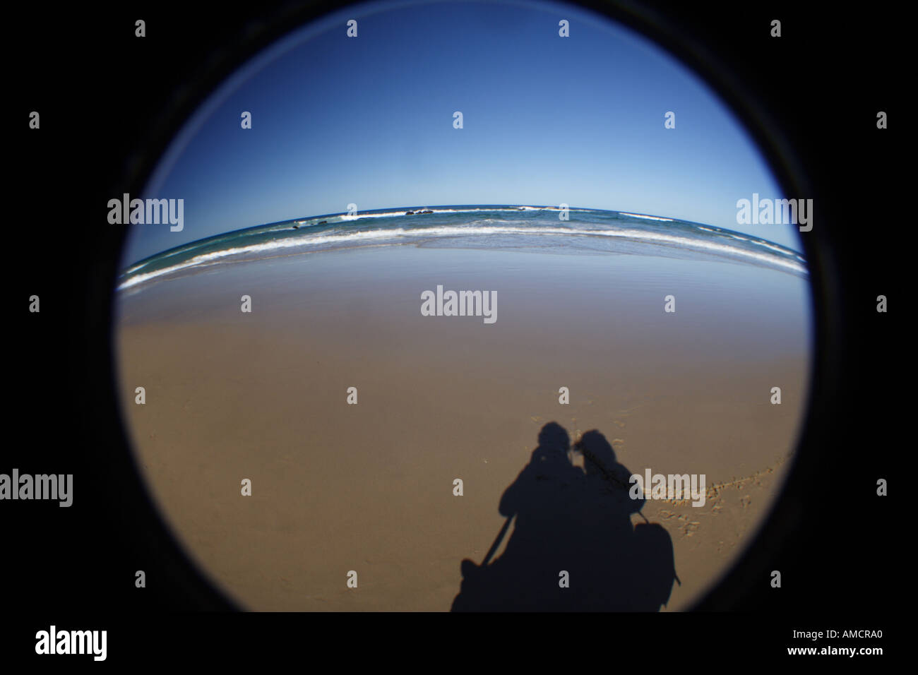 A FISHEYE VIEW OF A COUPLE TOGETHER ON A BEACH Stock Photo - Alamy