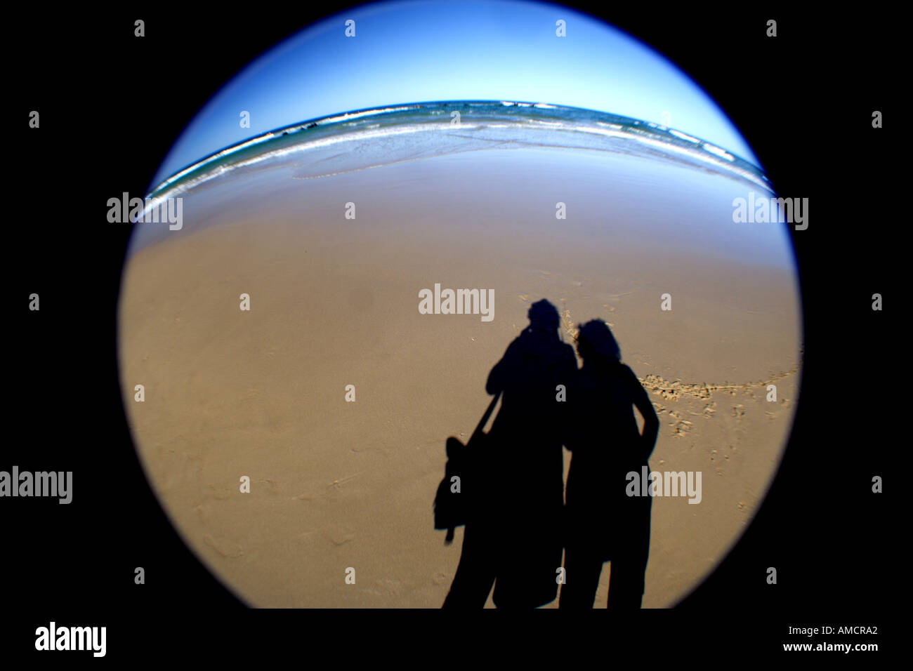 A FISHEYE VIEW OF A COUPLE TOGETHER ON A BEACH Stock Photo - Alamy