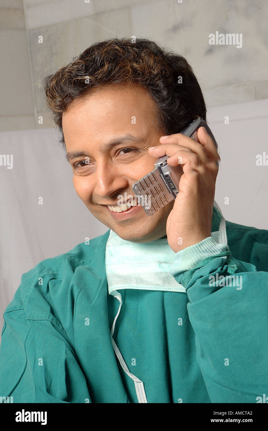 Surgeon talking on his mobile phone hi-res stock photography and images ...