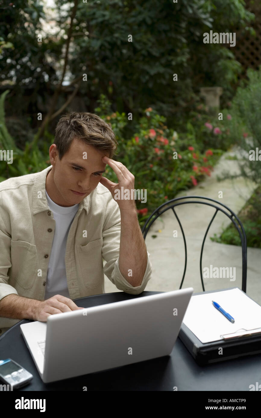 Old man migraine sitting outdoor hi-res stock photography and images ...