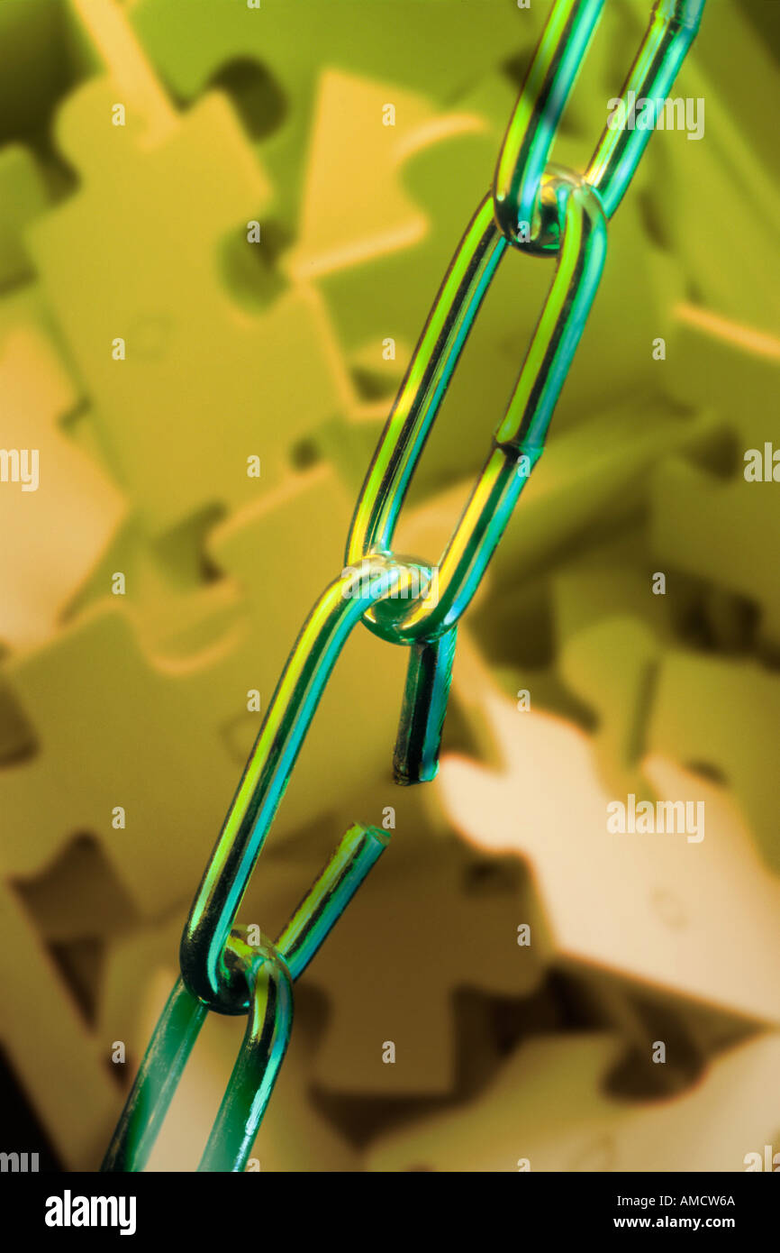 Chain and Jigsaw Puzzle Pieces Stock Photo - Alamy
