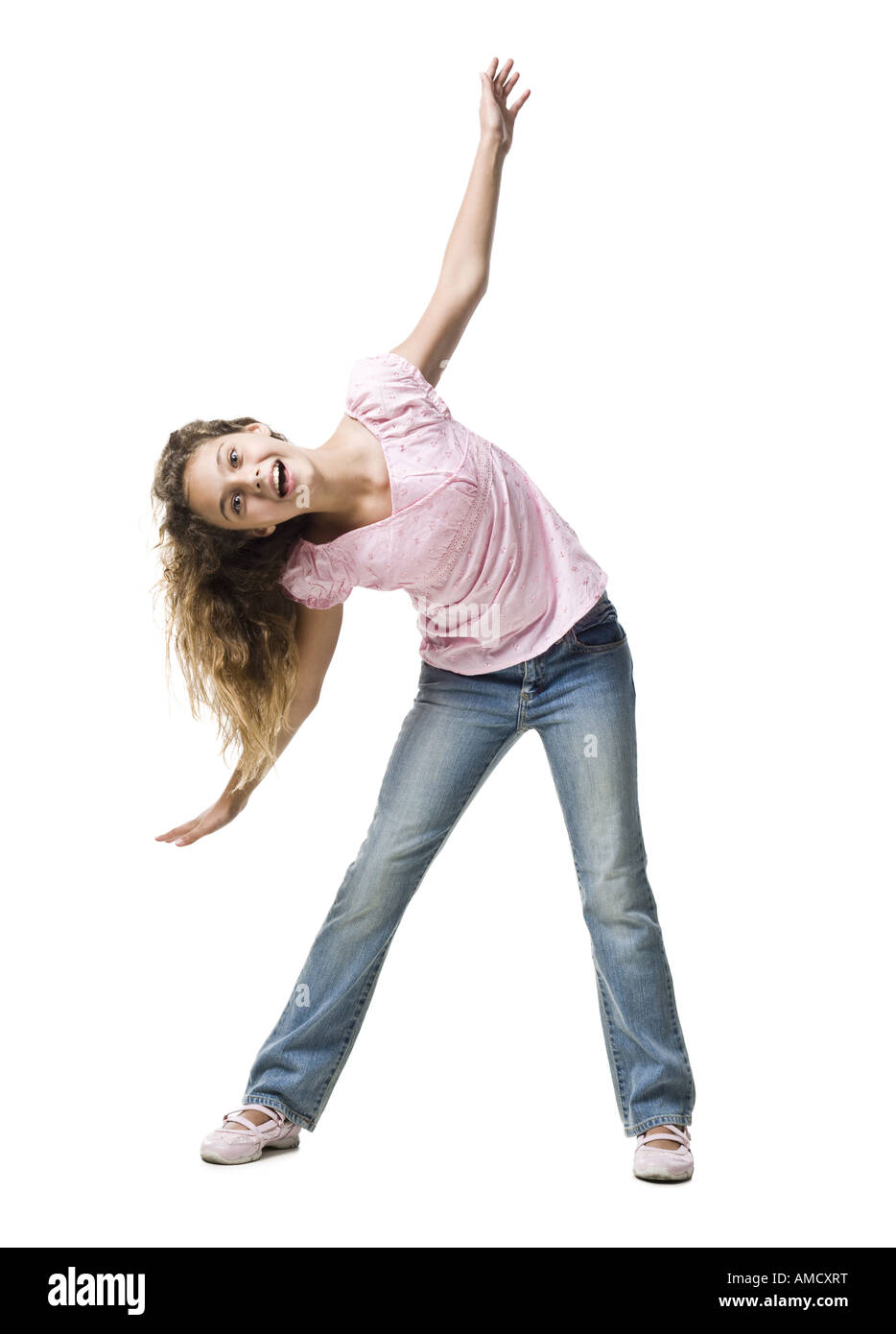 Girl leaning with arms up Stock Photo - Alamy