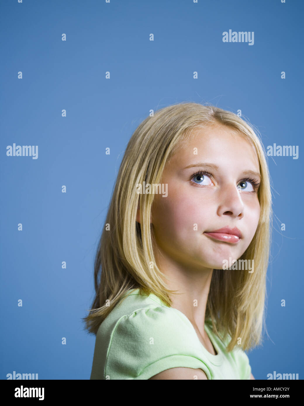 Closeup of girl looking up Stock Photo - Alamy