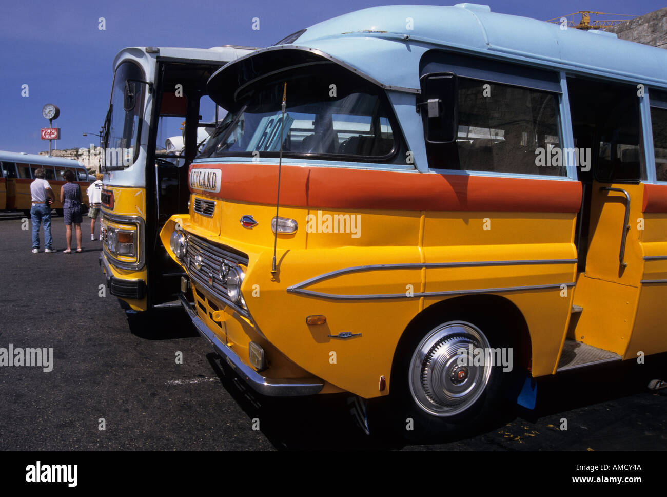 colourful Maltese buses at the bus terminal Valletta Malta Stock Photo ...