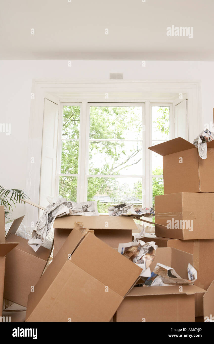 Pile of Boxes in Room Stock Photo - Alamy